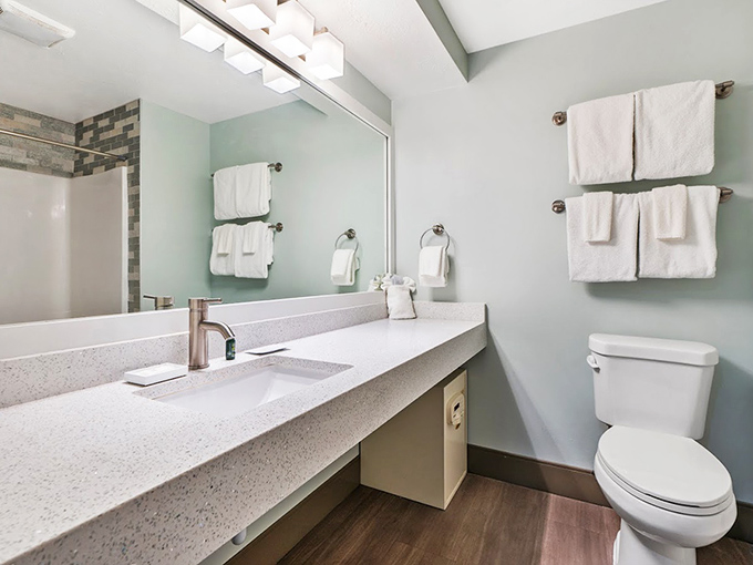 Pristine countertops and thoughtful design prove vacation bathrooms don't have to feel like an afterthought.