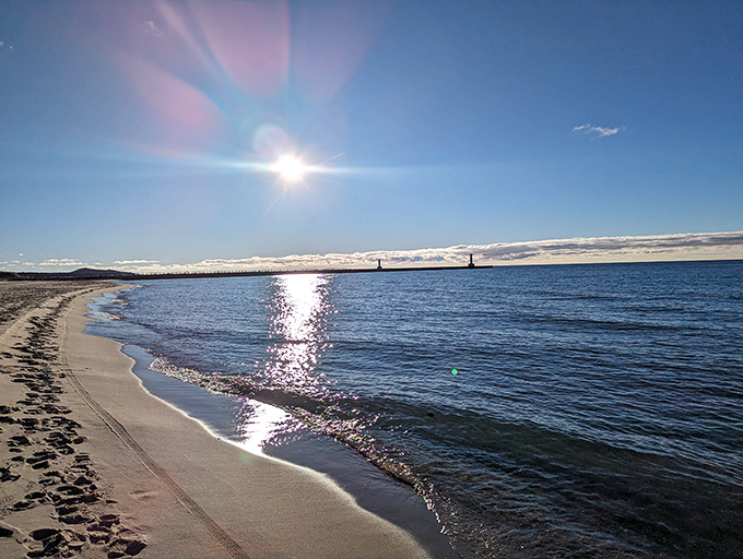 Lake Michigan's shoreline stretches into the horizon, offering a beach experience that rivals any ocean view.