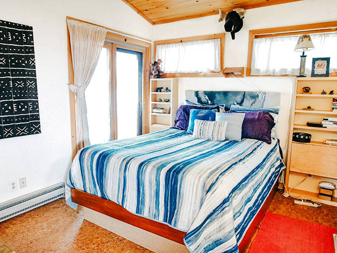 Drift off to dreams of tomorrow's adventures in this serene bedroom where comfort meets simplicity with Scandinavian flair.