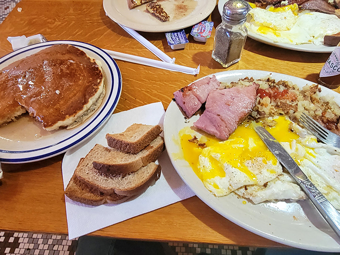 Breakfast served all day because some traditions, like perfectly cooked eggs alongside thick-cut ham, should never have time limits.