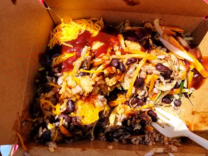 This isn't just a burrito bowl &ndash; it's a colorful celebration in a compostable container, where beans, rice, cheese, and veggies party together in perfect harmony.