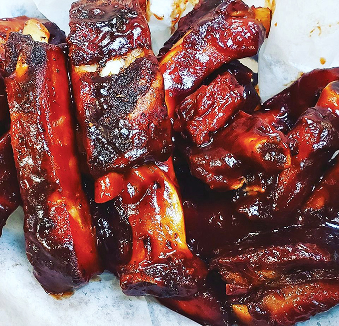 Caramelized perfection! These back ribs showcase the magical marriage of smoke, meat, and time &ndash; a romance for the ages.