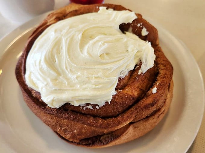 Cinnamon Roll: A spiral of sweet indulgence crowned with melting cream cheese frosting &ndash; close your eyes on first bite and savor the moment.