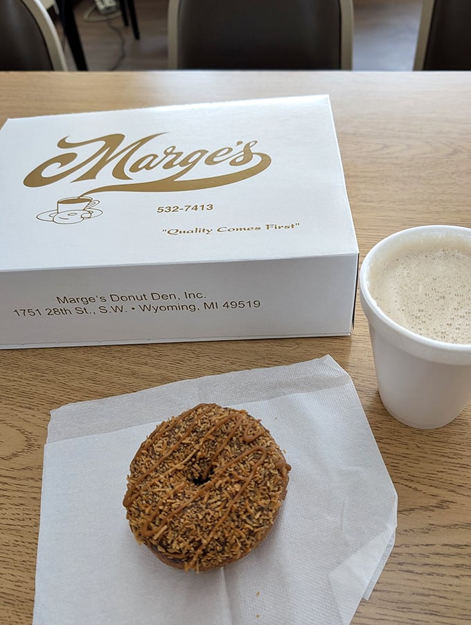 Sometimes happiness is as simple as a perfectly crafted donut and a steaming cup of coffee on a Michigan morning.