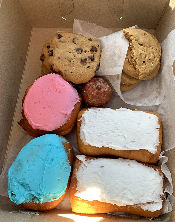 A box of pure joy – from pink-frosted circles to chocolate-dipped delights and hearty cookies that could make your grandmother jealous.