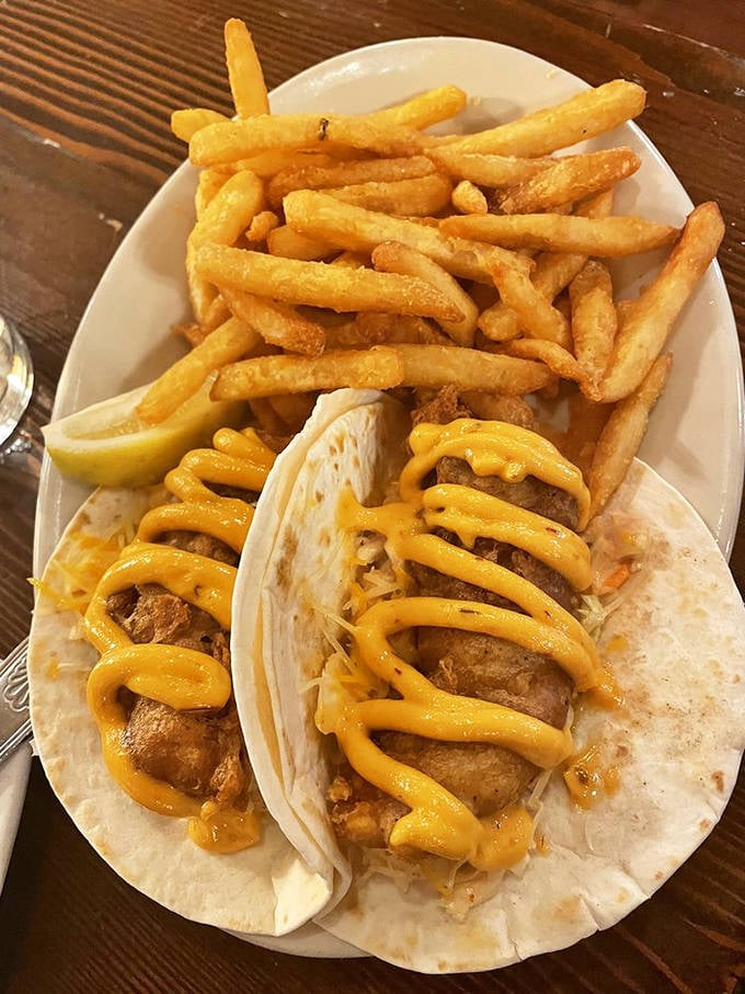 Fish tacos that make you forget you're in Minnesota—crispy, fresh, and drizzled with just enough sauce to make things interesting.