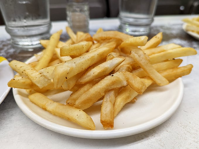 Golden, crispy fries that serve as the perfect sidekick to your coney dog adventure. Simple perfection that doesn't need fancy seasoning.