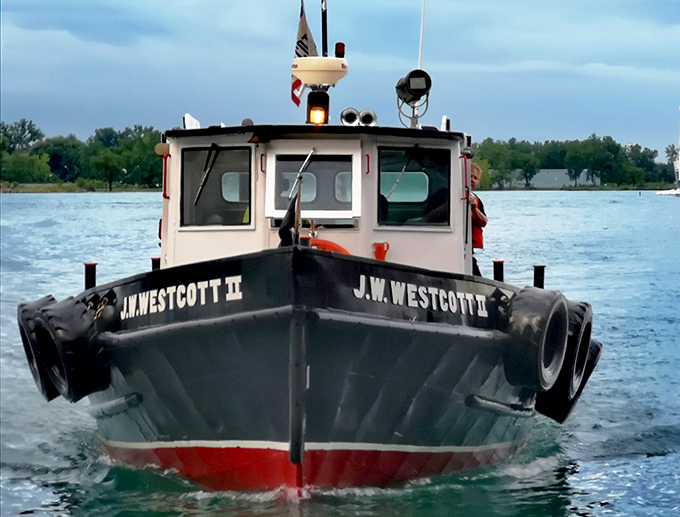 Front and center! The J.W. Westcott II proudly displays its mission statement: "We Deliver For You" &ndash; the maritime equivalent of "neither snow nor rain..."