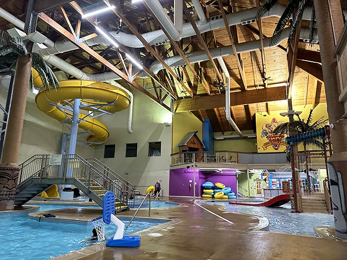 The interior design masterfully blends playful colors with practical layouts, creating distinct zones for different energy levels.