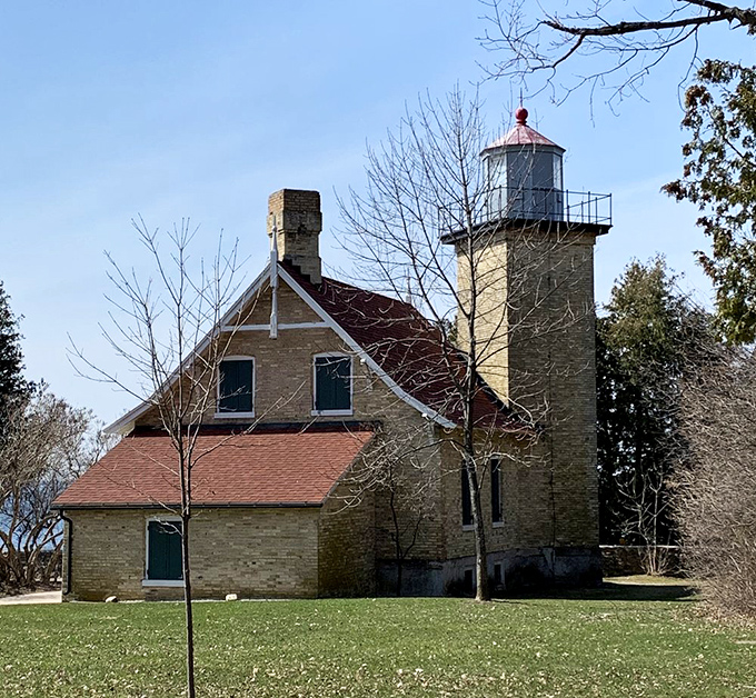 History meets natural beauty at the Eagle Bluff Lighthouse, where maritime tales come alive against Door County's stunning backdrop.
