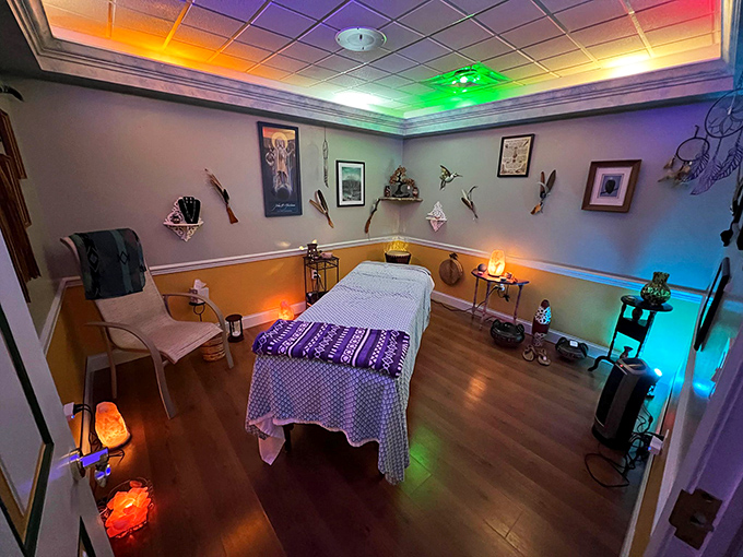 This serene massage room combines earthy tones with subtle lighting, creating the perfect environment for melting away tension.