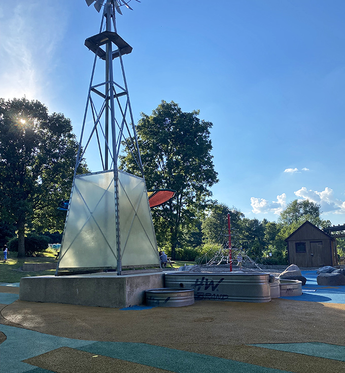 The metal windmill stands tall, a nostalgic nod to farming heritage that doesn't require actual chores or 5 AM wake-up calls.