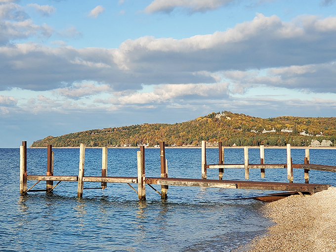 Forested hills create a stunning backdrop to Lake Street Beach, proving Michigan knows how to frame a perfect waterfront scene.