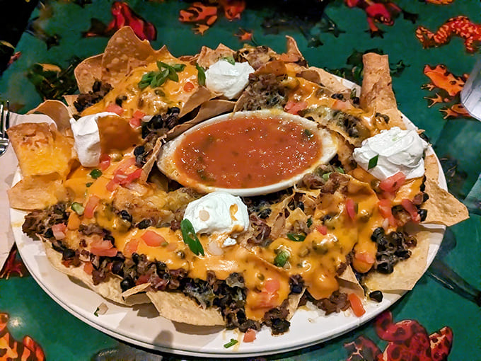 Nachos piled this high require either a sharing mentality or a complete absence of shame, both of which are perfectly acceptable approaches.