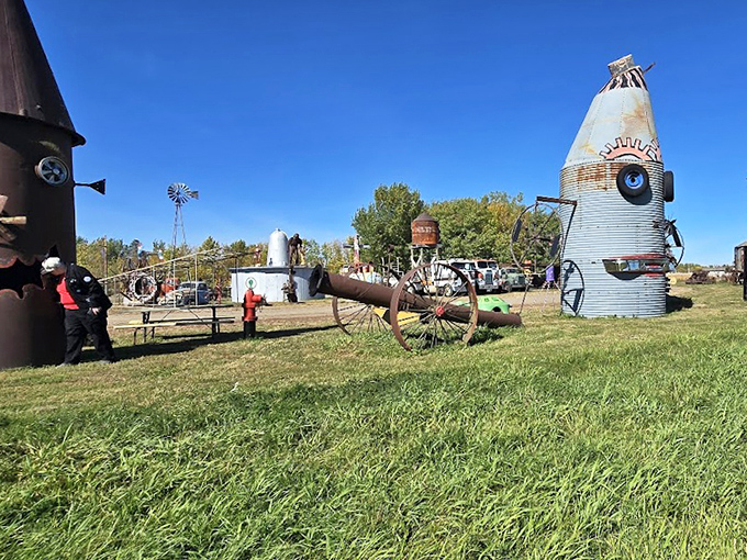 Space-age dreams take concrete form in these retro-futuristic rocket sculptures, pointing skyward like metallic monuments to imagination.