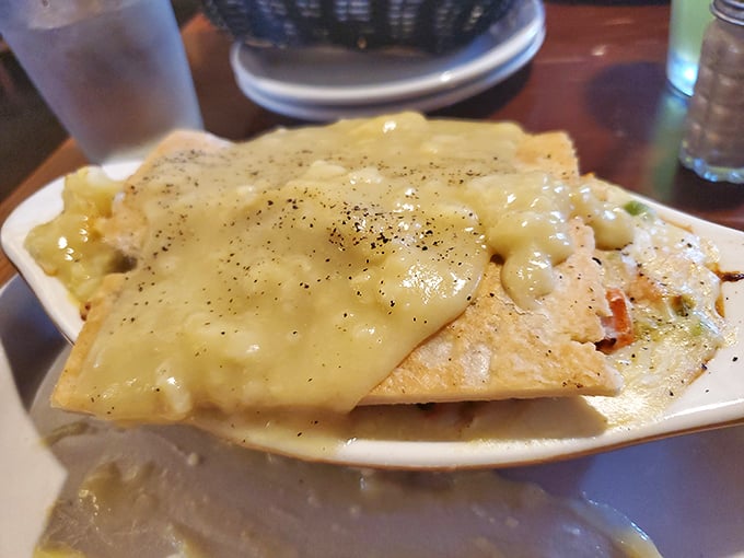 The star attraction: Shepherd's Pie with its golden cheese topping and cloud-like mashed potatoes hiding savory treasures beneath.