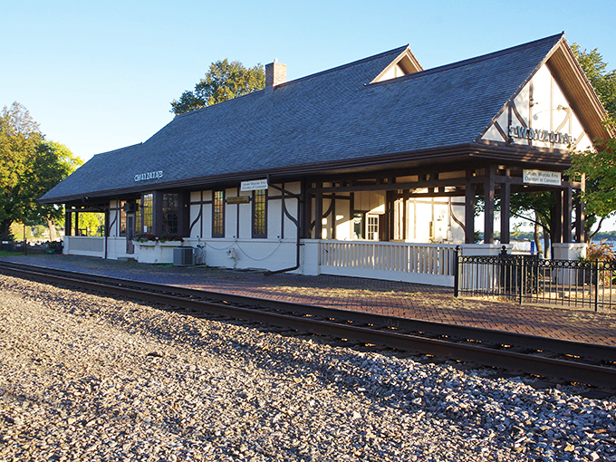 The historic train station stands as a charming reminder of Wayzata's railroad past, now welcoming visitors instead of steam engines.