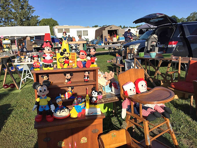 Childhood memories for sale: Vintage Mickey Mouse figurines stand at attention, ready to spark joy for collectors or introduce a new generation to classic characters.