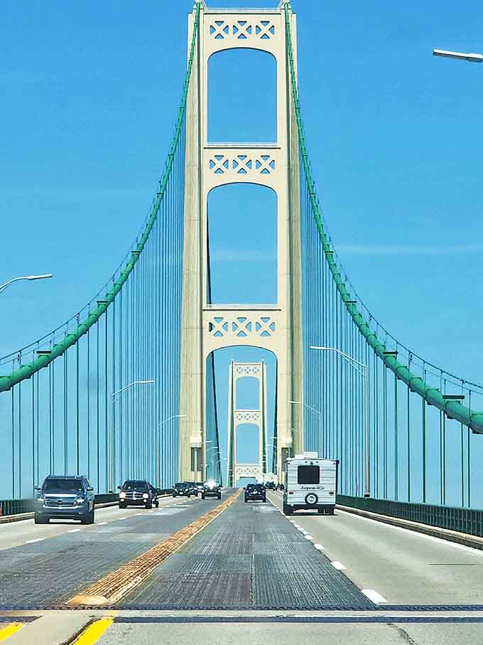 Driving across the Mighty Mac offers breathtaking views of blue waters stretching to the horizon. The bridge's elegant design has made it Michigan's most recognizable landmark since 1957.