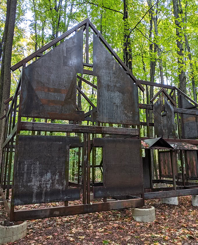 "A Dream of Home" invites contemplation about what makes a house a home, its skeletal frame both present and absent in the forest clearing.