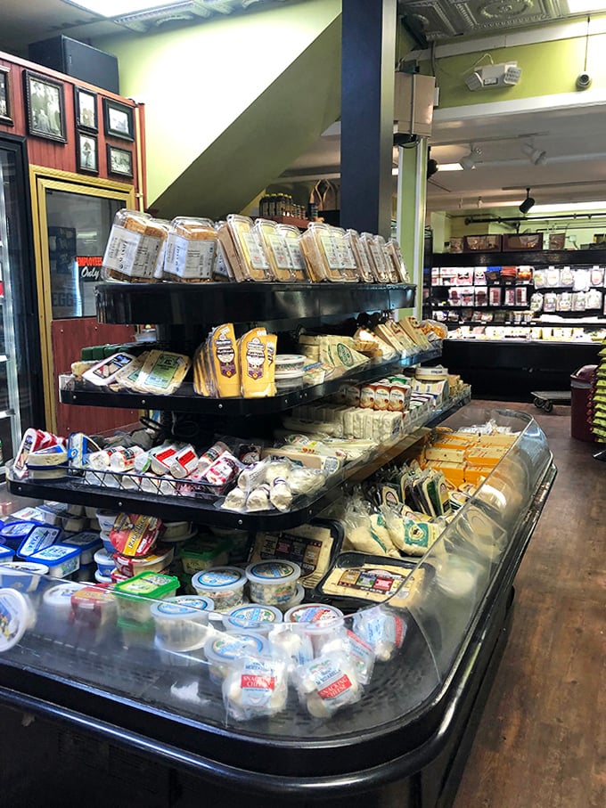 A cheese lover's dream display featuring everything from everyday staples to artisanal Michigan specialties, perfect for sunset porch gatherings.