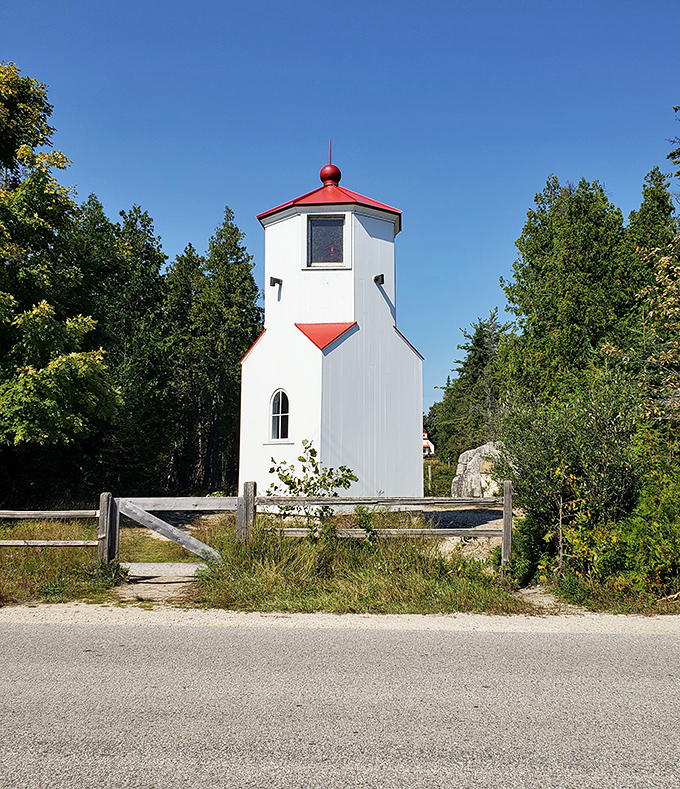The Lower Rangelight stands as a charming maritime sentinel with its distinctive red roof &ndash; Instagram-worthy history that once guided sailors home.