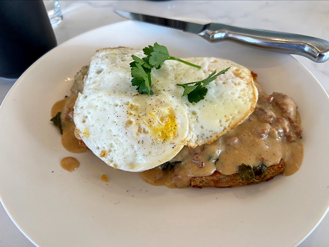 Country cooking elevated to art form &ndash; savory biscuits swimming in rich gravy, crowned with perfectly fried eggs.