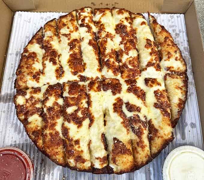 Golden-brown cheese breadsticks that pull apart with Instagram-worthy cheese stretches &ndash; the perfect opening act before your pizza headliner arrives.