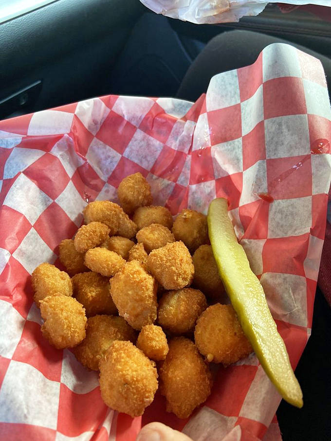 Wisconsin cheese curds transformed into crunchy, molten treasures—proof that sometimes the best things in life are simple, fried, and squeak between your teeth.