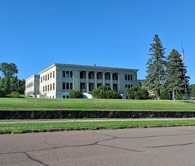 The Cook County Court House stands dignified against blue skies, a testament to small-town civic pride.