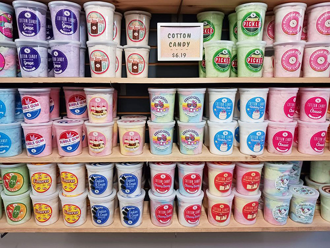 Cotton candy tubs line the shelves like a pastel rainbow, each container promising a different flavor of that magical melt-in-your-mouth sugar cloud experience.