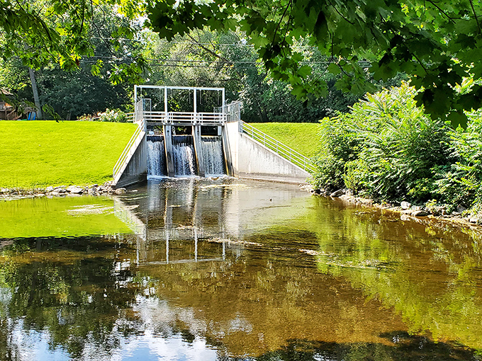 Hell's official weather bureau sign delivers the town's signature humor with meteorological authority that's purely tongue-in-cheek and delightful.