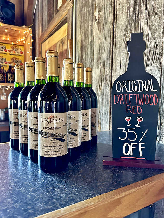 The Original Driftwood Red, the winery's signature medium-dry red, displayed with a chalkboard announcement that would make any bargain hunter smile.