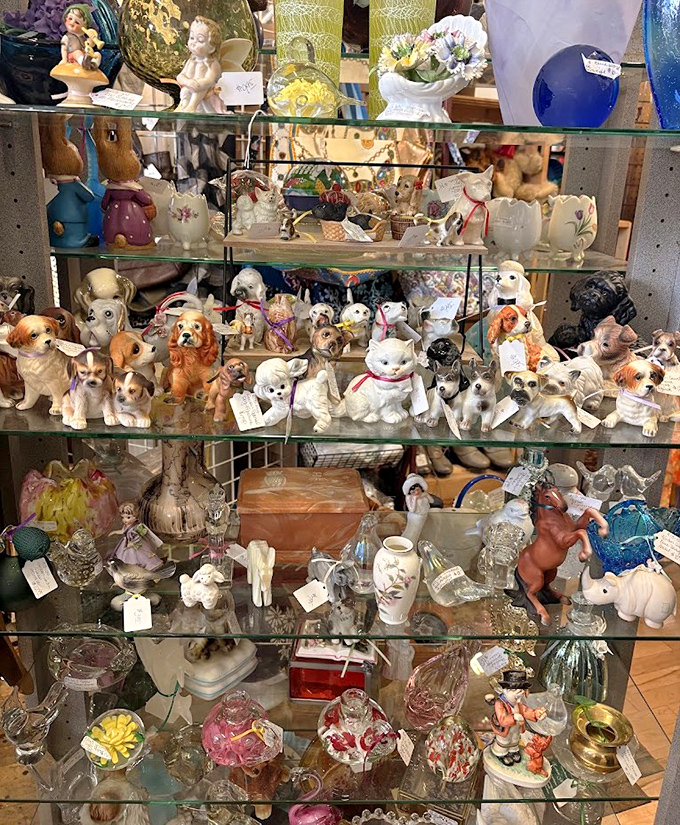 Vintage porcelain figurines stand at attention, a tiny army of collectibles with personality to spare.
