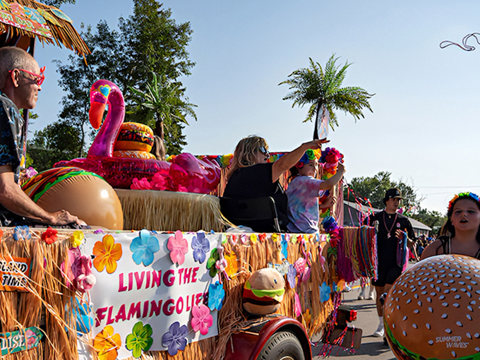 "Living the Flamingo Life" isn't just a float theme, it's the unofficial motto of this festival where pink birds outnumber actual Michigan wildlife.