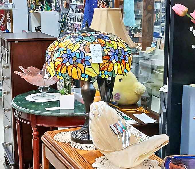 A Tiffany-style lamp creates its own spotlight among vintage treasures &ndash; the kind of find that makes you rearrange your living room in your mind. Photo credit: <a href="https://maps.google.com/maps/contrib/108147614758950586306" target="_blank" rel="noopener noreferrer">Linda Chaffee - Gogarn</a>