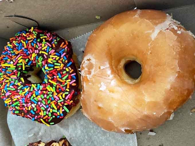 A study in contrasts: the colorful sprinkle-topped chocolate donut plays yin to the classic glazed's yang.