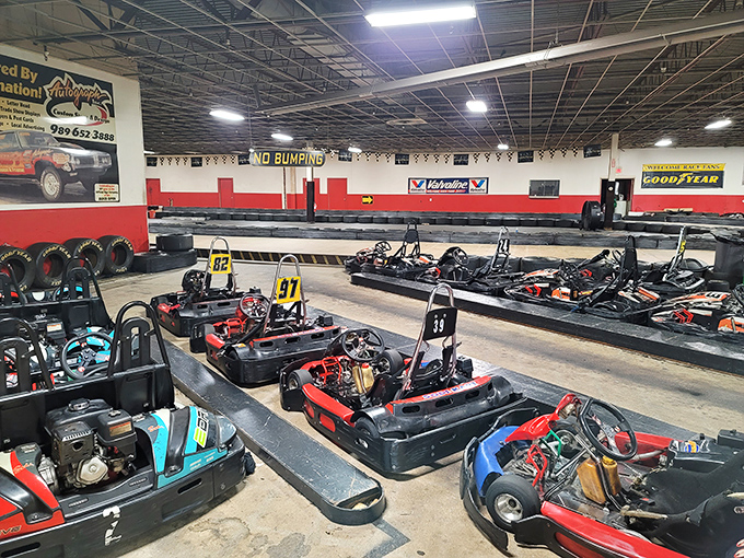 The impressive fleet of go-karts awaits drivers, each machine tuned for optimal performance on the challenging indoor track.
