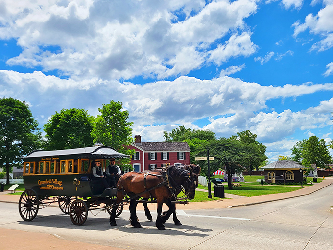 Horse-drawn carriages offer a striking contrast to steam power, demonstrating how quickly transportation evolved during America's rapid industrial growth.