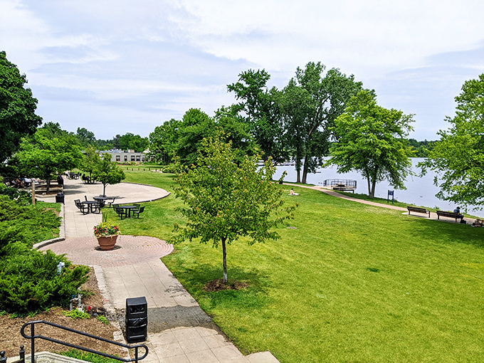 John Collins Park: A verdant oasis connecting village to lake, where families picnic and paths meander alongside sparkling waters.