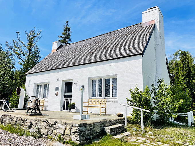 The keeper's cottage looks like it's waiting for someone to return, perhaps with stories of storms and shipwrecks.
