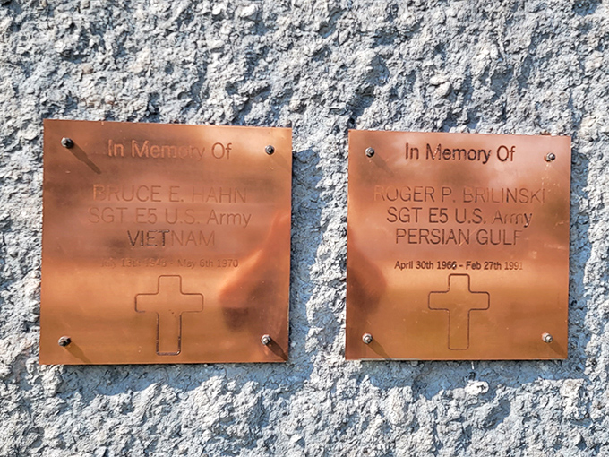 These memorial plaques honor local veterans, adding a touching layer of meaning to what might otherwise be just a fun photo stop.