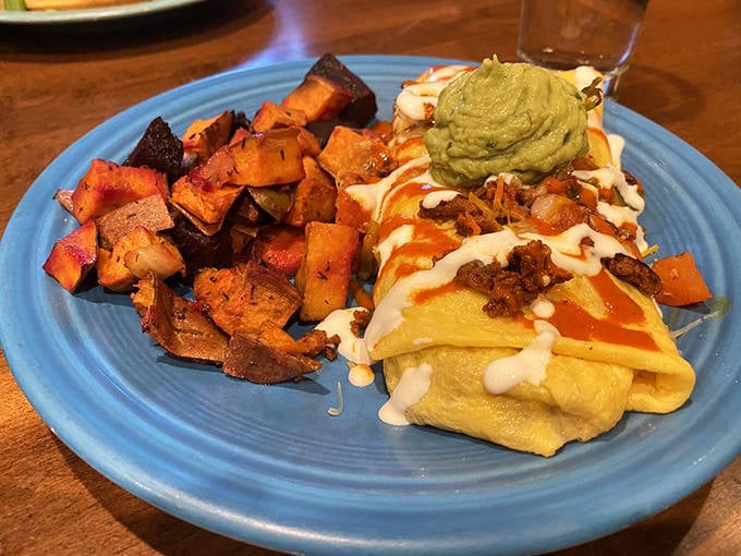 Eggs, tortilla, and a rainbow of toppings create a Mexican-inspired morning fiesta that puts ordinary breakfast to shame.