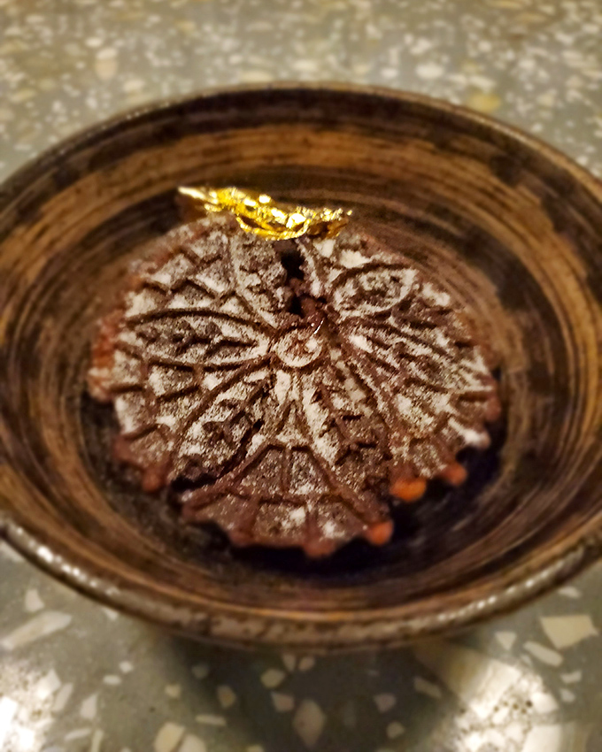 A chocolate-topped dessert that doesn't just satisfy your sweet tooth&mdash;it throws a party for it, complete with a golden accent.