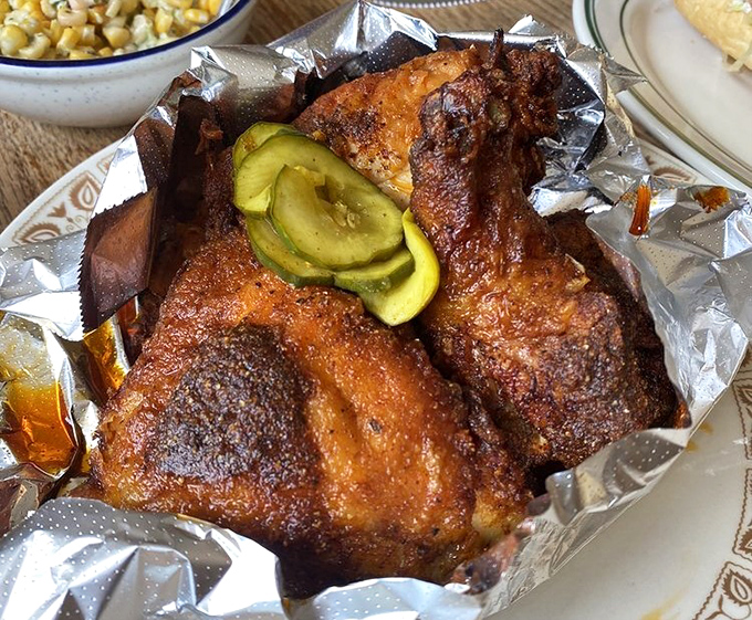 Nashville Hot Chicken brings the sweet-spicy heat, topped with house-made pickles that provide the perfect cooling counterpoint.