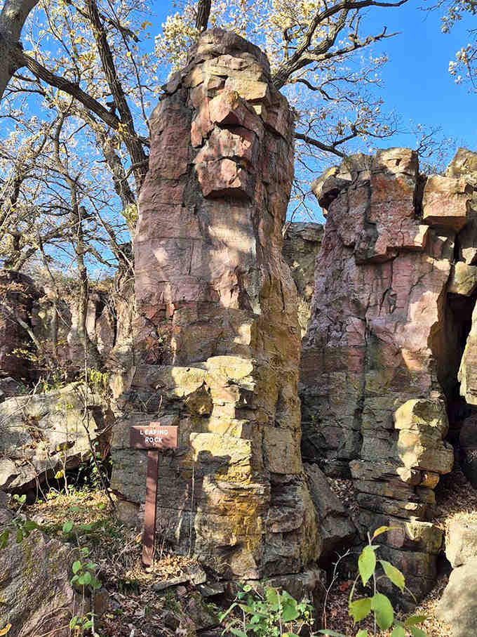 This weathered rock formation resembles a stoic face, silently watching over centuries of human visitors to this sacred quarrying site.