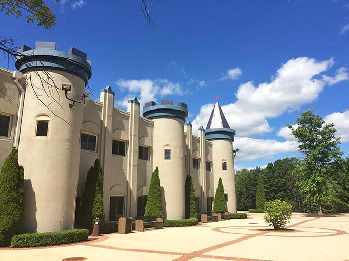 The castle's open courtyard area provides space for community gatherings, with carefully maintained landscaping enhancing the regal atmosphere.