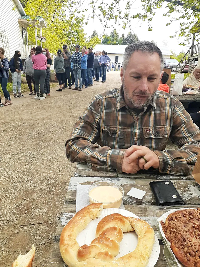 The outdoor seating area offers a perfect spot to immediately devour your purchases while soaking in the peaceful countryside views.