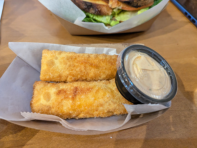 Crispy on the outside, tangy and juicy within &ndash; these breaded pickle spears with creamy dipping sauce might just steal the show from your sandwich.