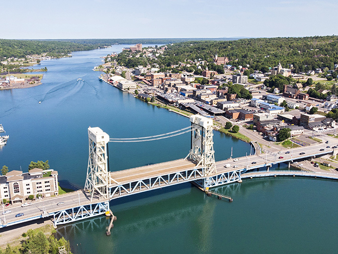 The iconic Portage Lake Lift Bridge connects Hancock and Houghton, its engineering marvel raising to accommodate passing ships.